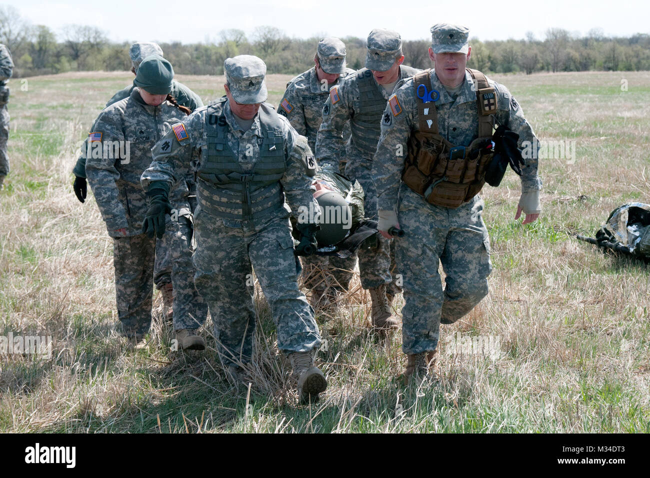 Soldiers from Company C, 700th Brigade Support Battalion, carry a ...