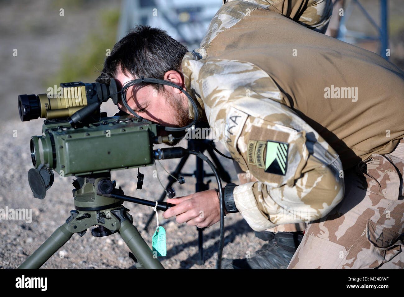 A Czech Republic forward air controller looks at targets before ...