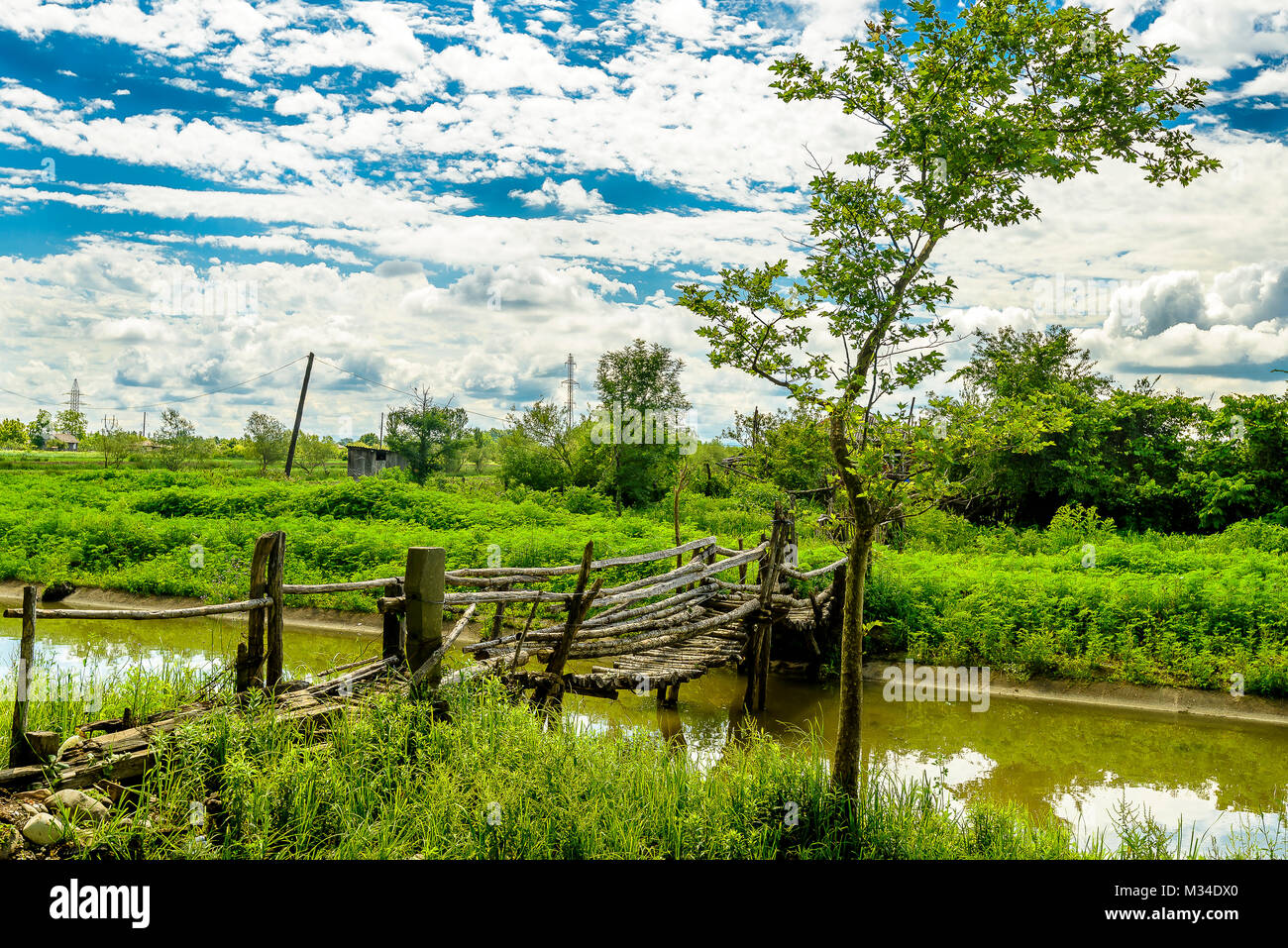 Old wooden bridge over a small river in a Georgian village Stock Photo ...