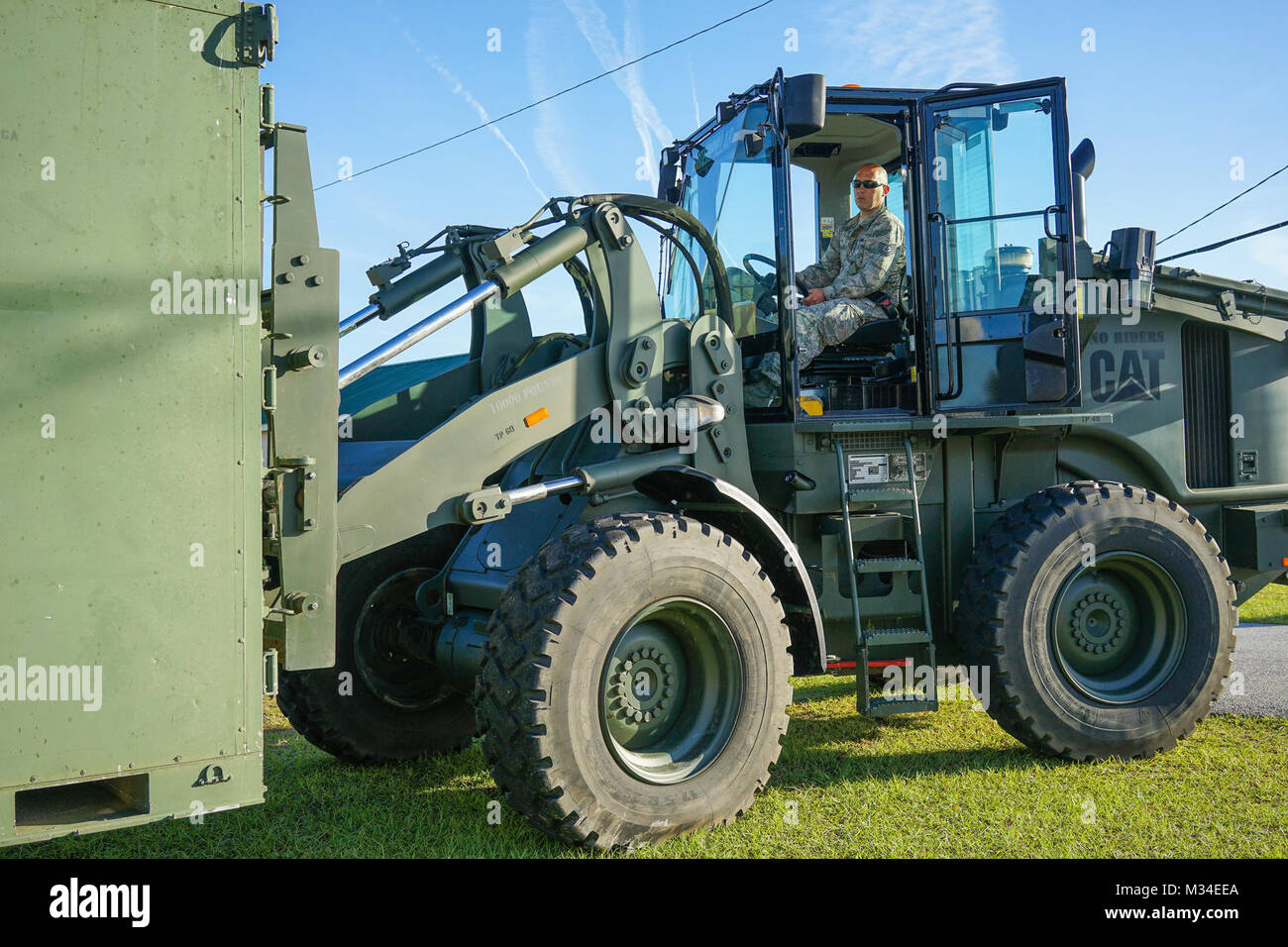 An Airman from the 283rd Combat Communications Squadron (CCS) from ...