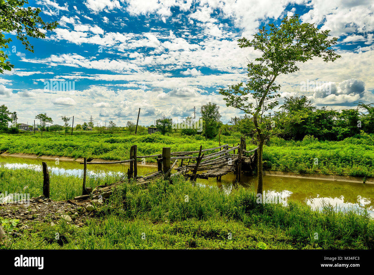 Old wooden bridge over a small river in a Georgian village Stock Photo ...