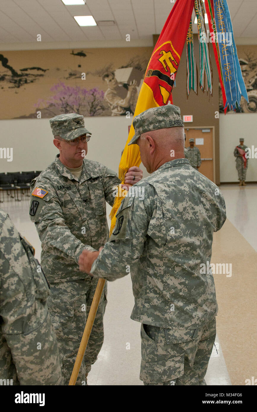 Col. Gregory Lankford hands the 45th Field Artillery Brigade colors to ...