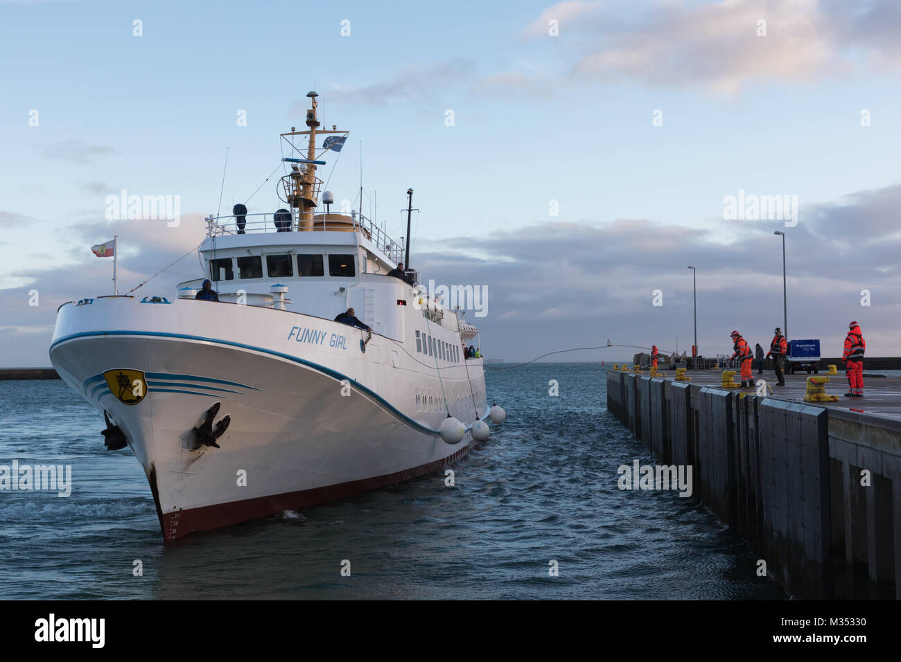 Funny Girl on Heligoland pier Stock Photo - Alamy
