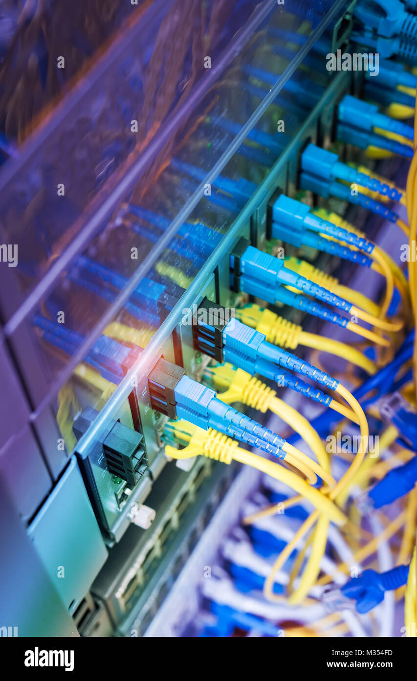 Fiber Optic cables connected to optic ports and UTP, Network cables ...