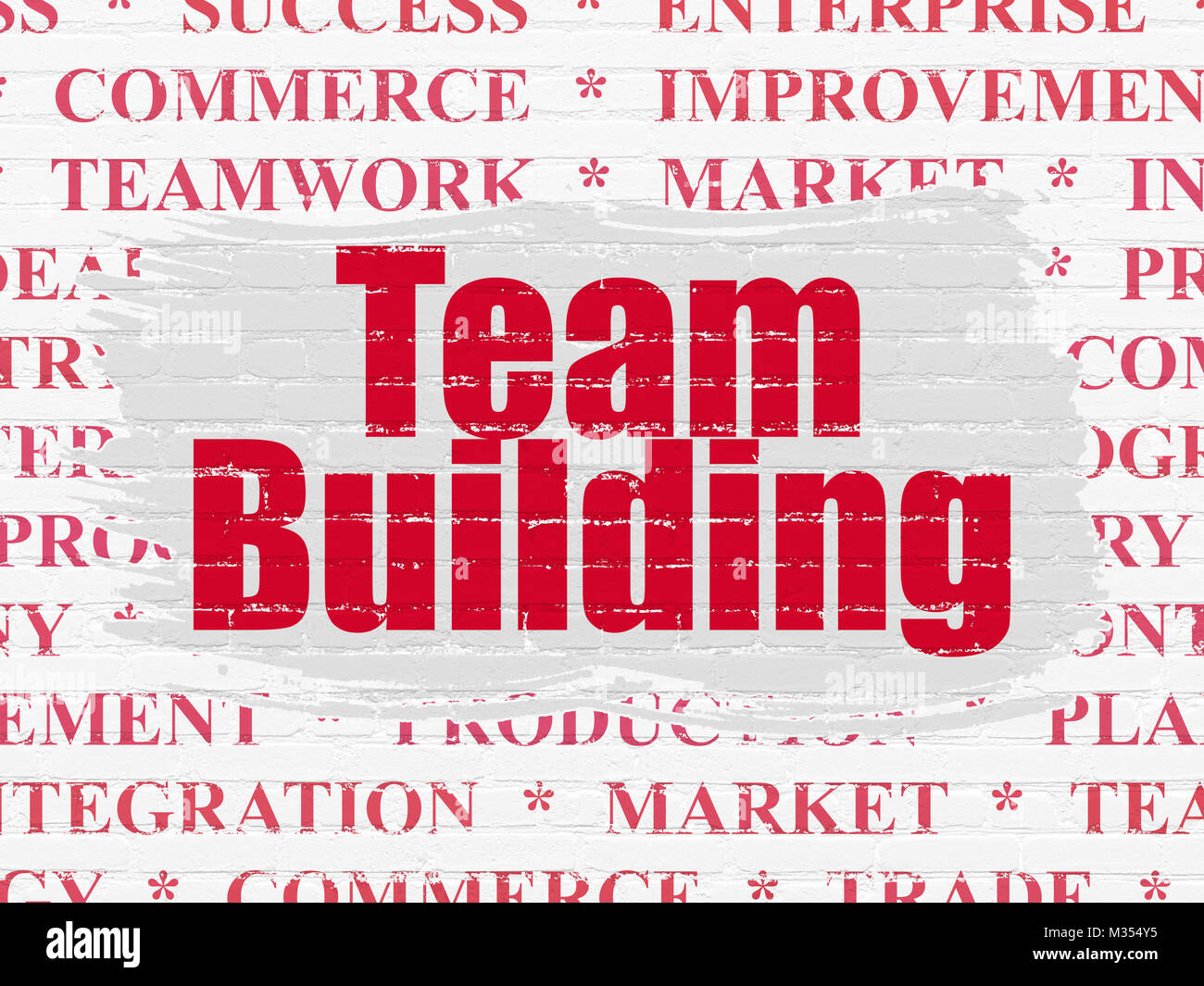 Finance concept: Team Building on wall background Stock Photo - Alamy