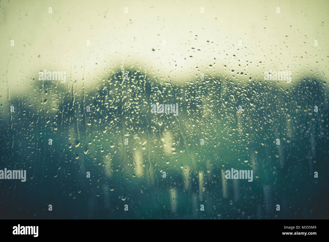 Autumn rain water drops on window glass background Stock Photo - Alamy