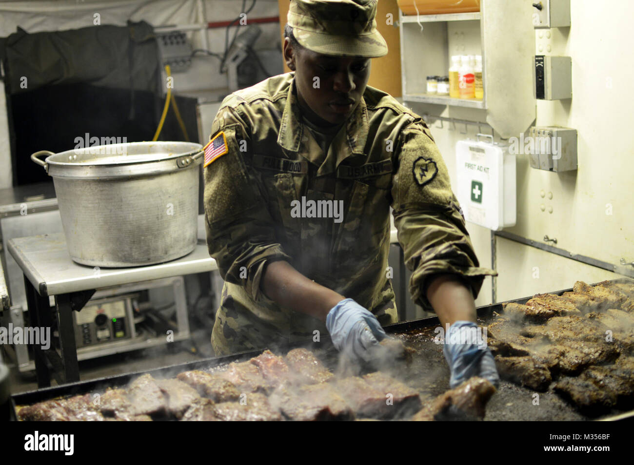 A culinary specialist assigned to 3rd Battalion, 7th Field Artillery ...