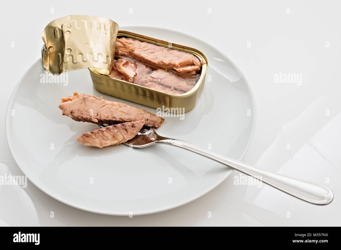 open mackerel box in the dish from above Stock Photo - Alamy