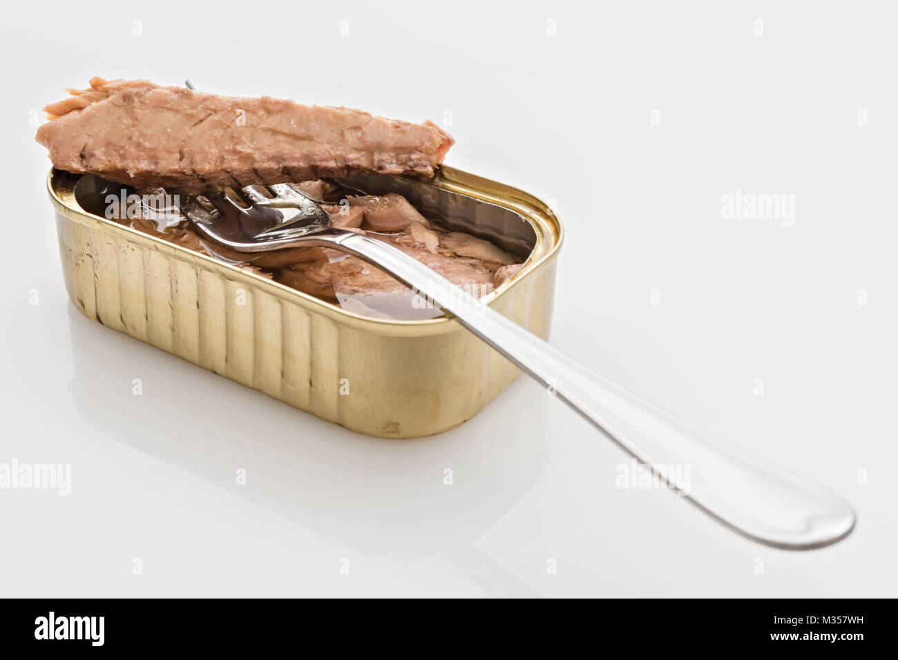 mackerel box with fork from above 2 Stock Photo - Alamy