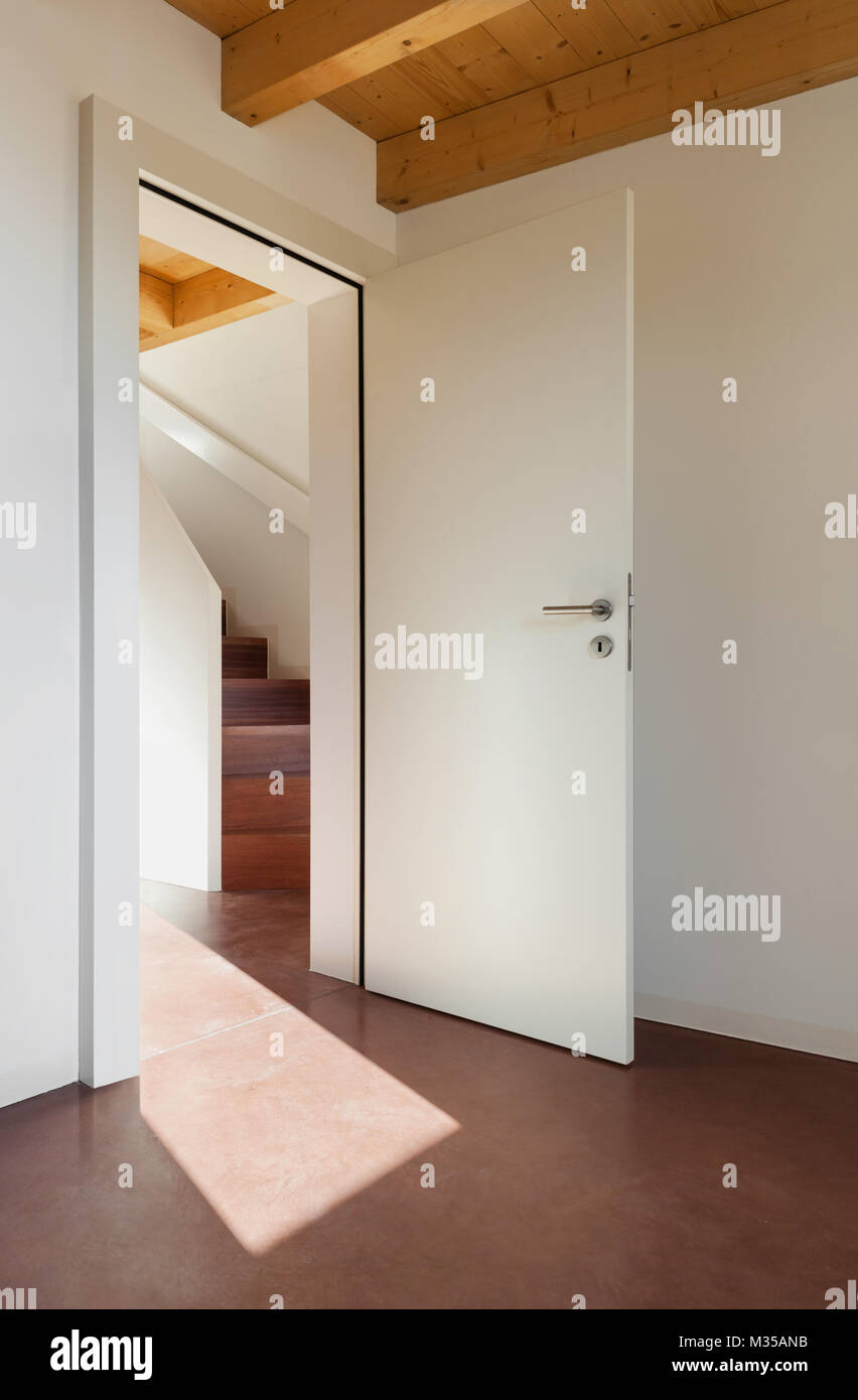 comfortable empty loft, interior, room with door open Stock Photo - Alamy