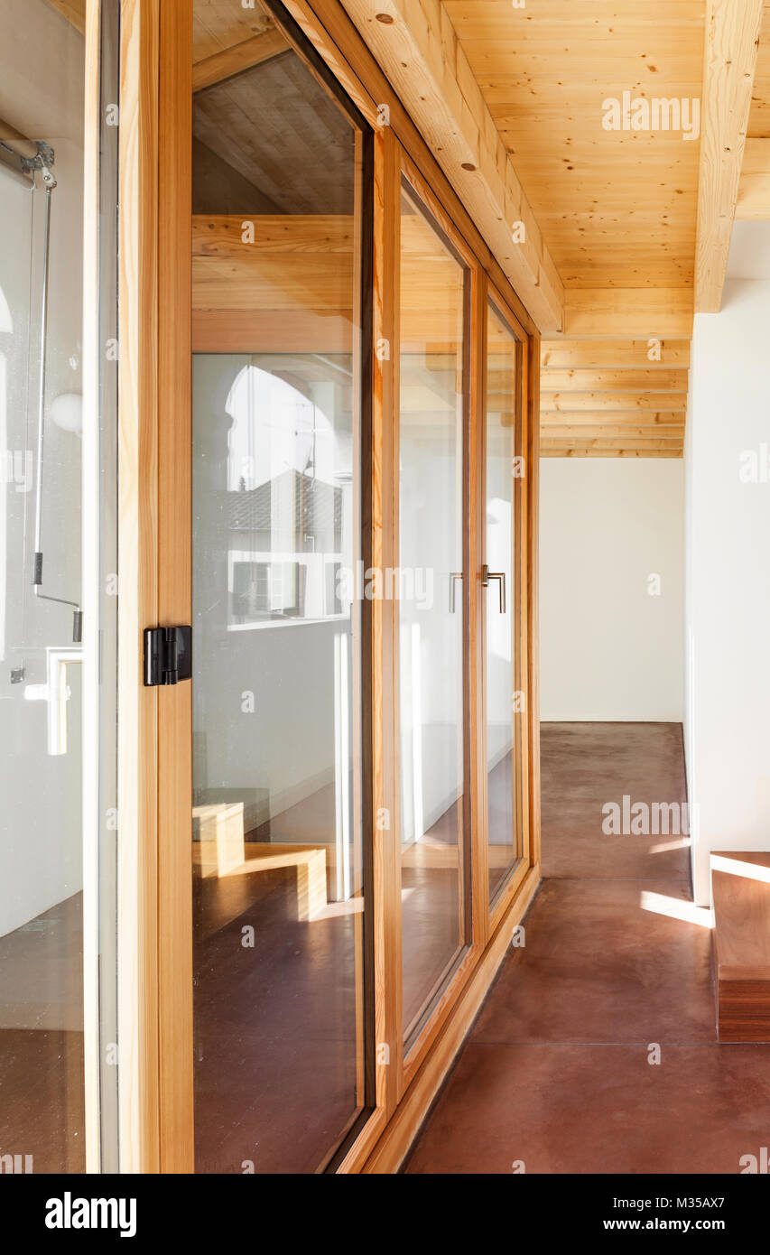 comfortable empty loft, interior, windows view Stock Photo - Alamy