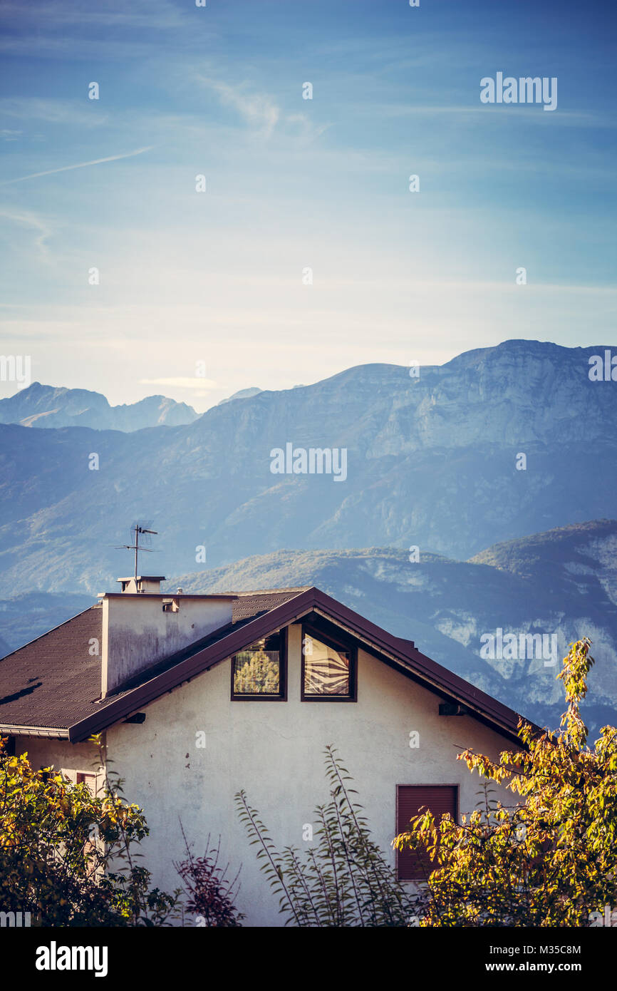 Roof of typical italian house in autumnal Alps Stock Photo - Alamy
