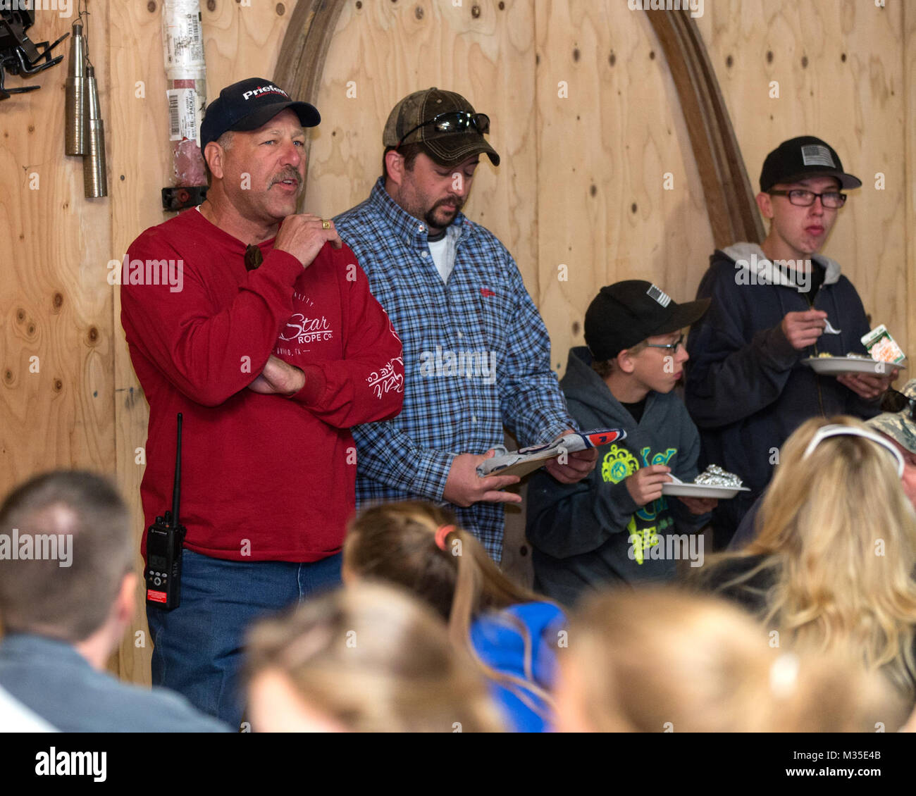 Gerry Sheppard, owner of Covey Creek ranch welcomes the volunteers and ...