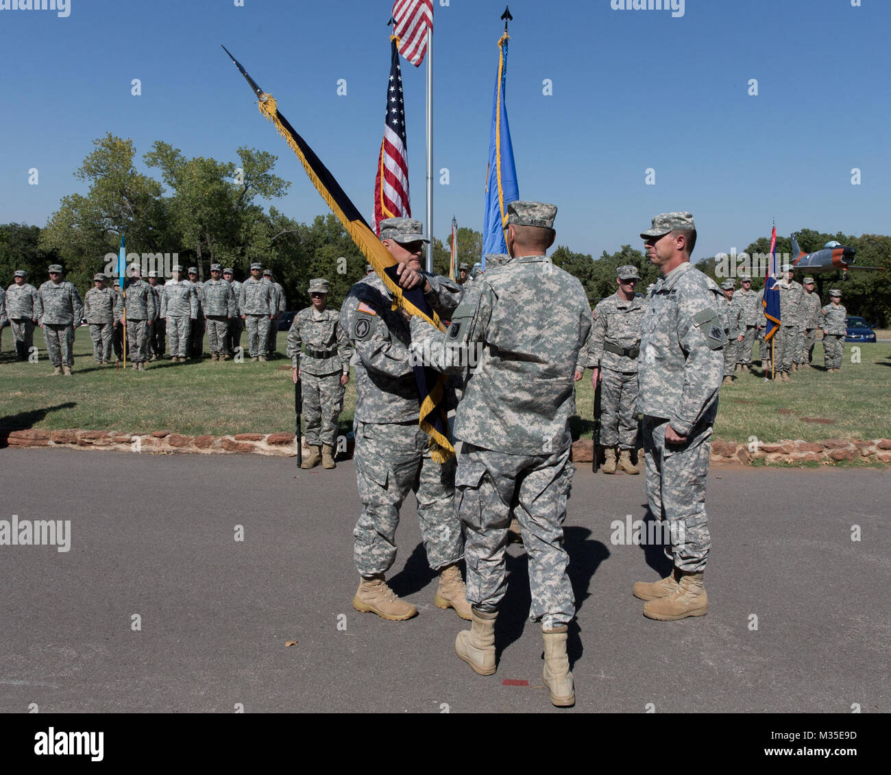 Major General Robbie L. Asher, passes the guidon to incoming commander ...