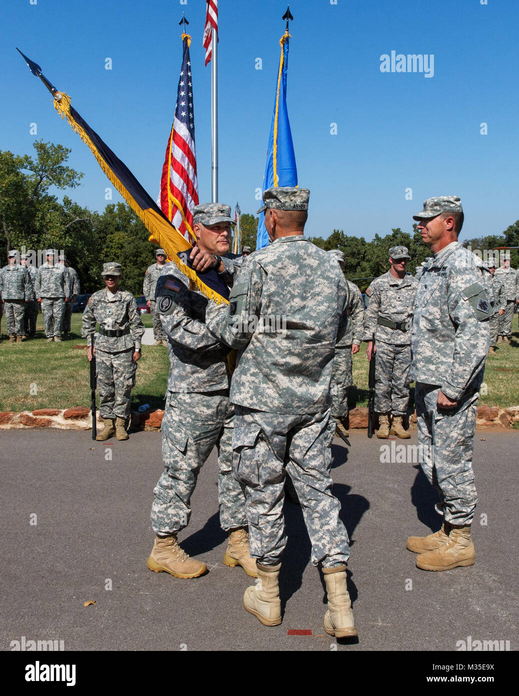 Major General Robbie L. Asher, passes the guidon to incoming commander ...