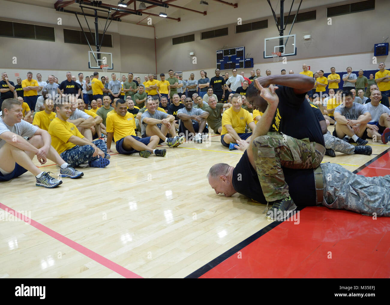 CAMP H.M. SMITH (Nov. 10, 2015) Spc. Brandon Buchanan demonstrates a ...