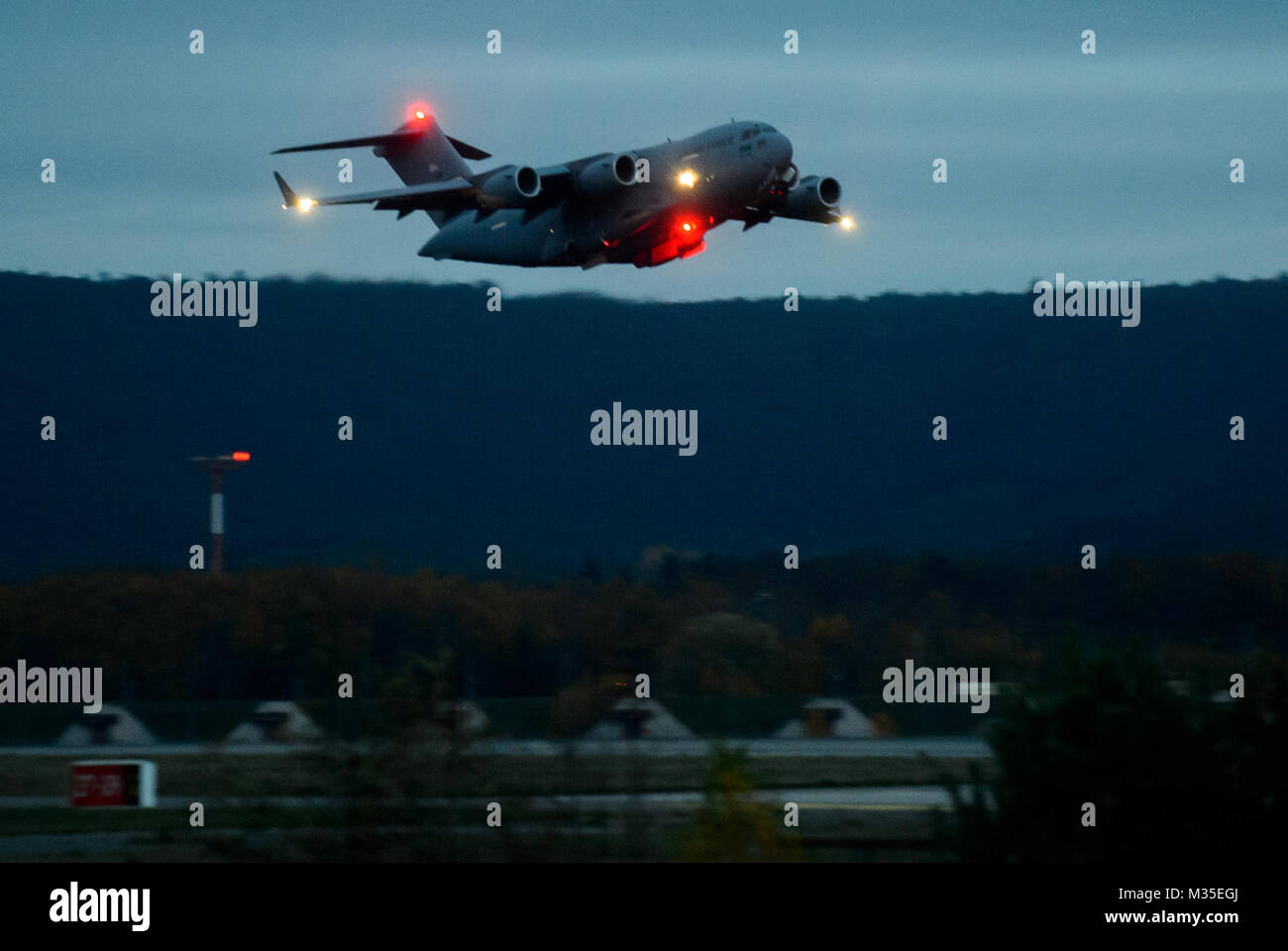 A C-17 Globemaster III carrying medical personnel and patients takes ...