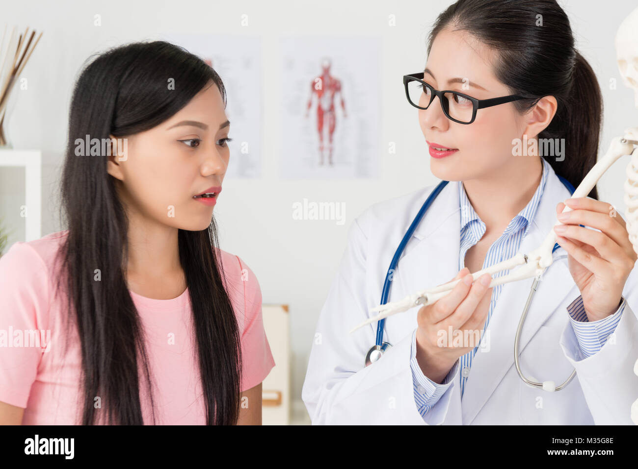 attractive beauty girl patient asking problem when doctor using ...