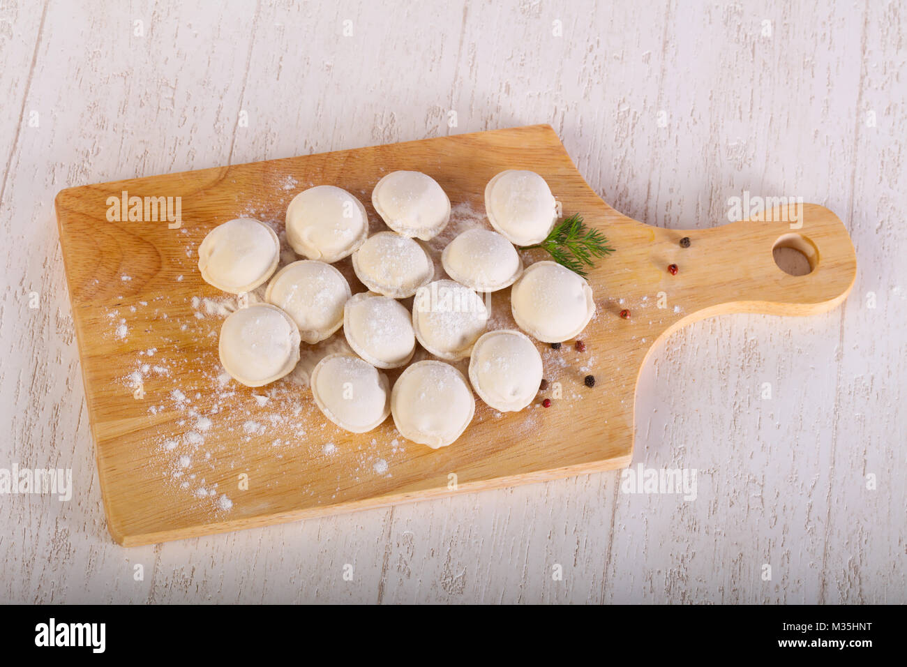 Raw dumplings for cooking Stock Photo - Alamy