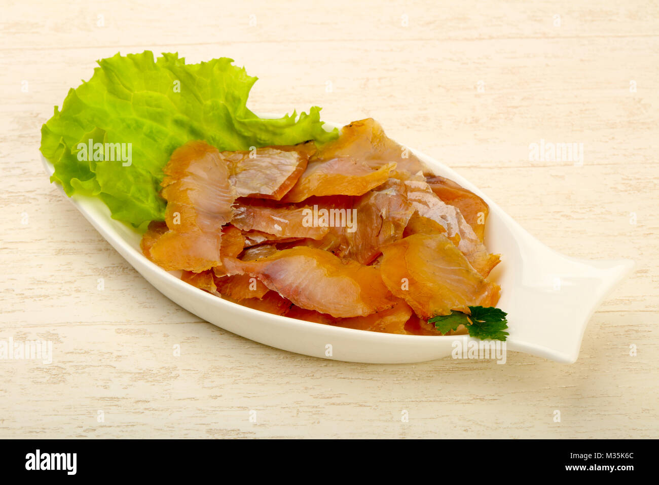 Smoked catfish fillet carpaccio Stock Photo - Alamy