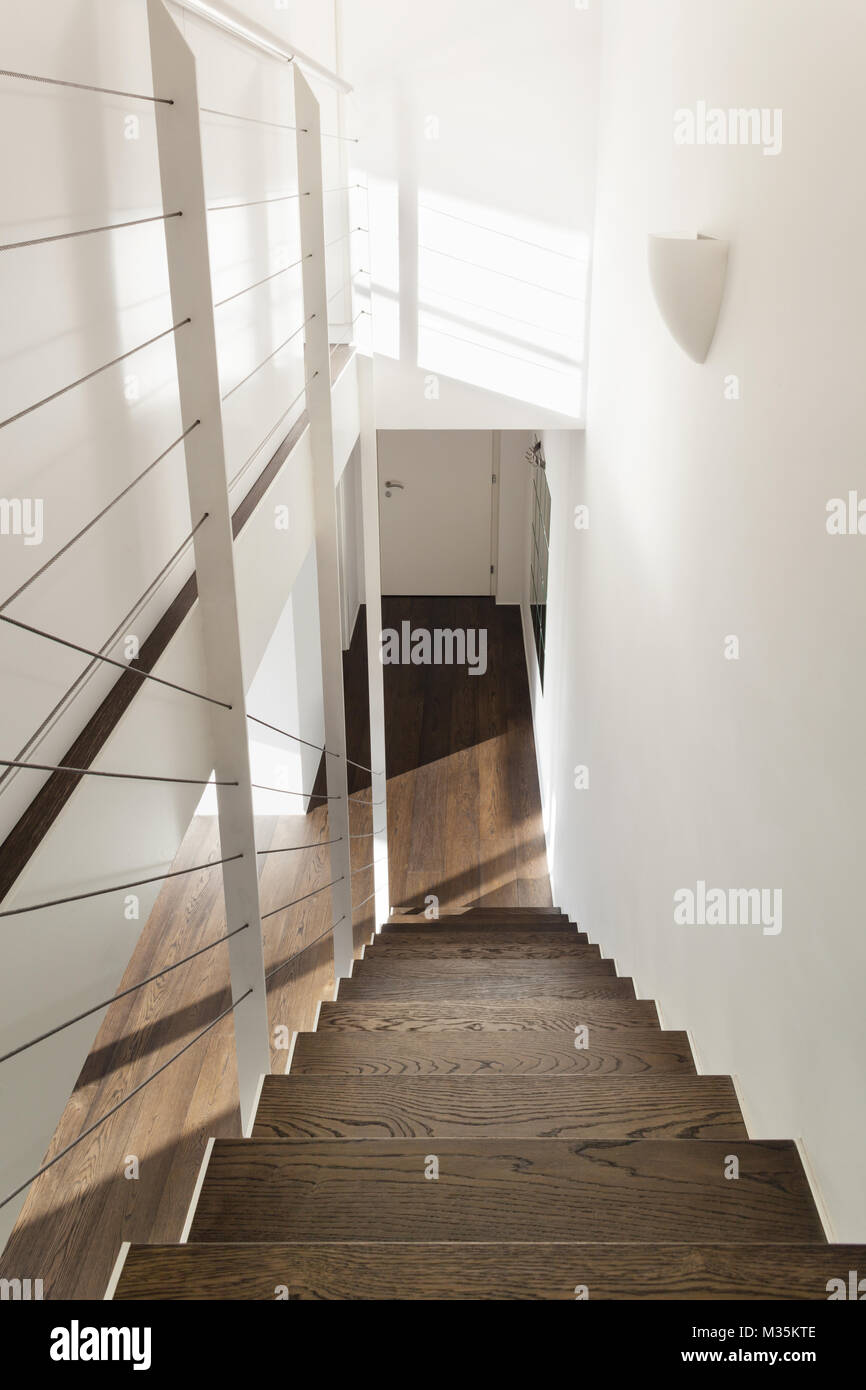 beautiful interior of a new apartment, view entrance from the stairs ...