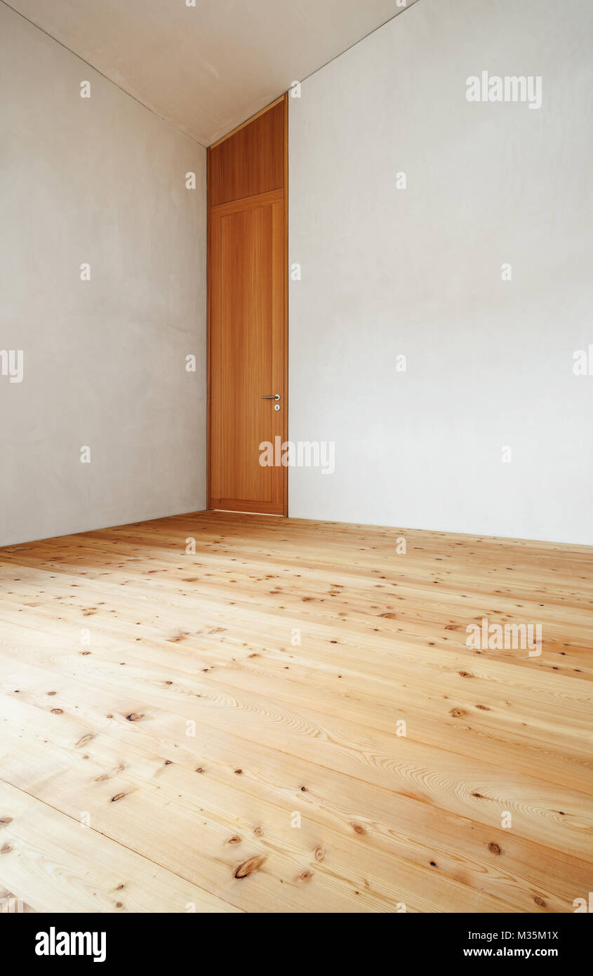 modern house, room with concrete walls, door closed Stock Photo - Alamy