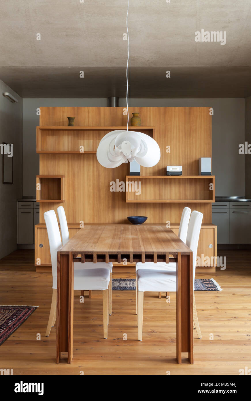 beautiful wooden dining table, interior of a chalet Stock Photo - Alamy