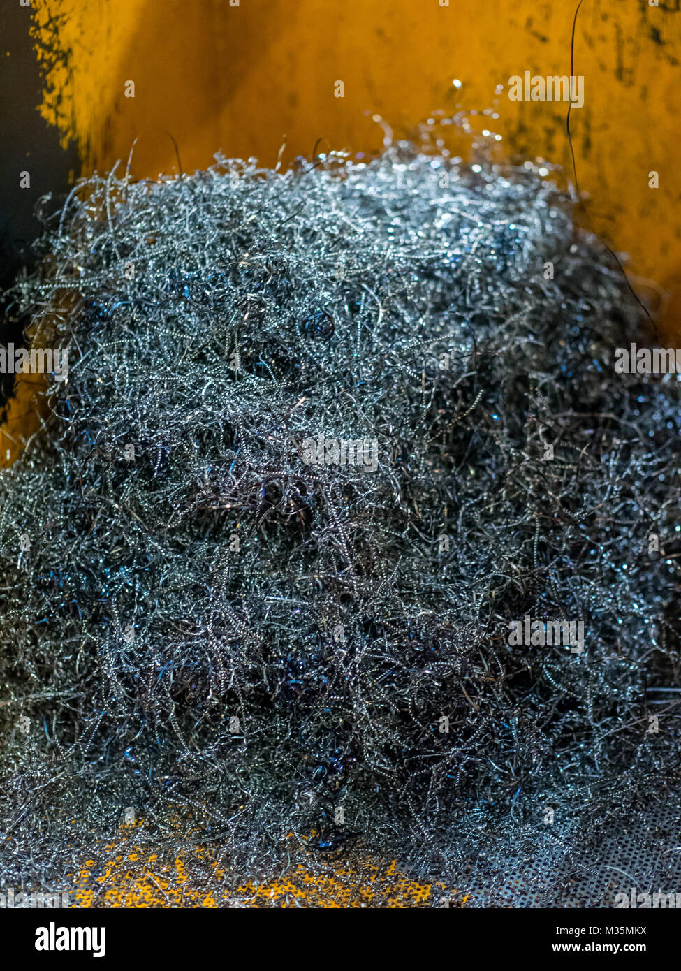 the steel wool in the waste, lies in the container Stock Photo - Alamy