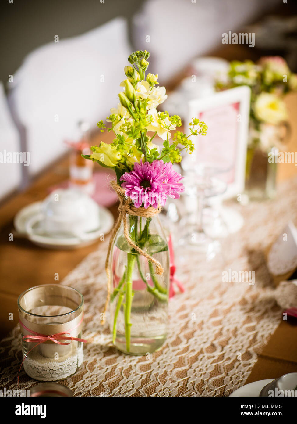 the small table decoration with wildflowers, natural and subtle ...