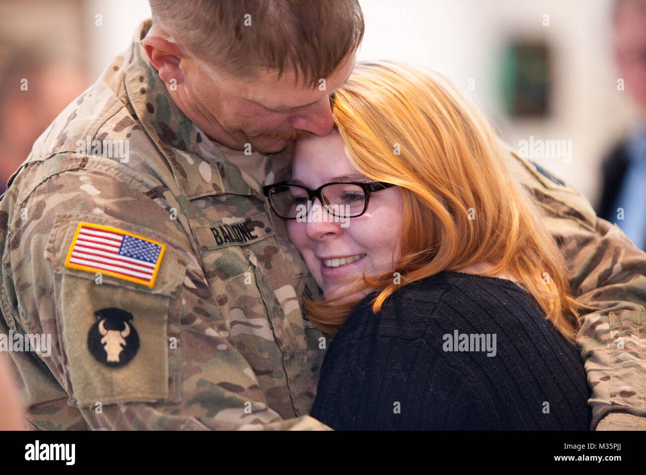 Master Sgt. Anthony Ballone hugs his daughter Rylee Tate at a welcome ...