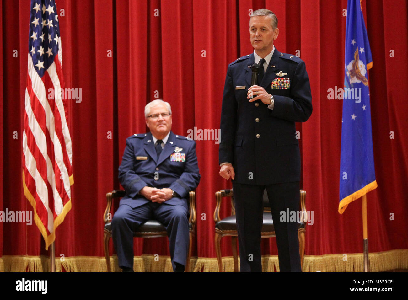 Looks on during a promotion ceremony hi-res stock photography and ...