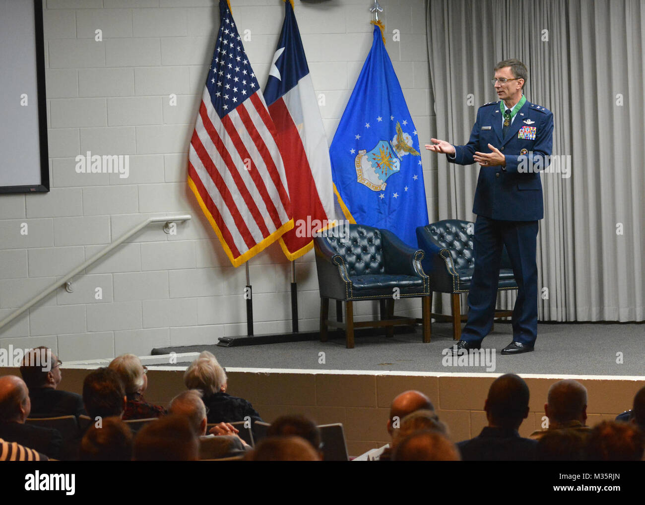 Maj. Gen. Kenneth W. Wisian thanks family and friends during a ceremony ...
