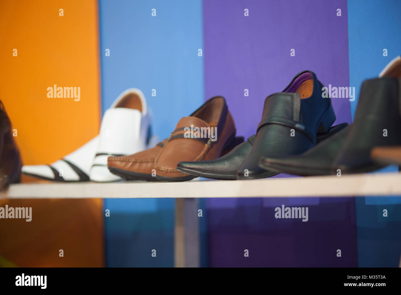 Mens shoes on display at trade fair Stock Photo - Alamy