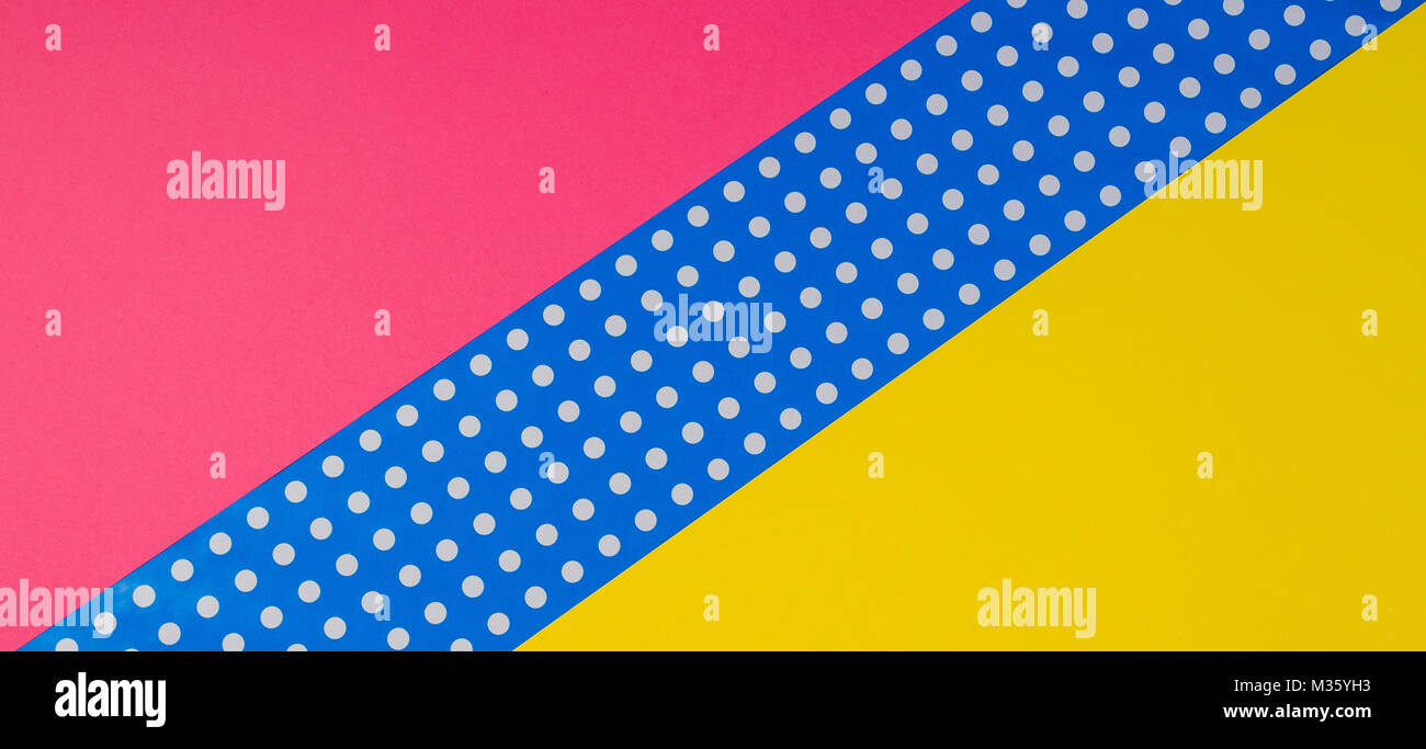 Abstract geometric yellow, pink and blue polka dot paper background ...