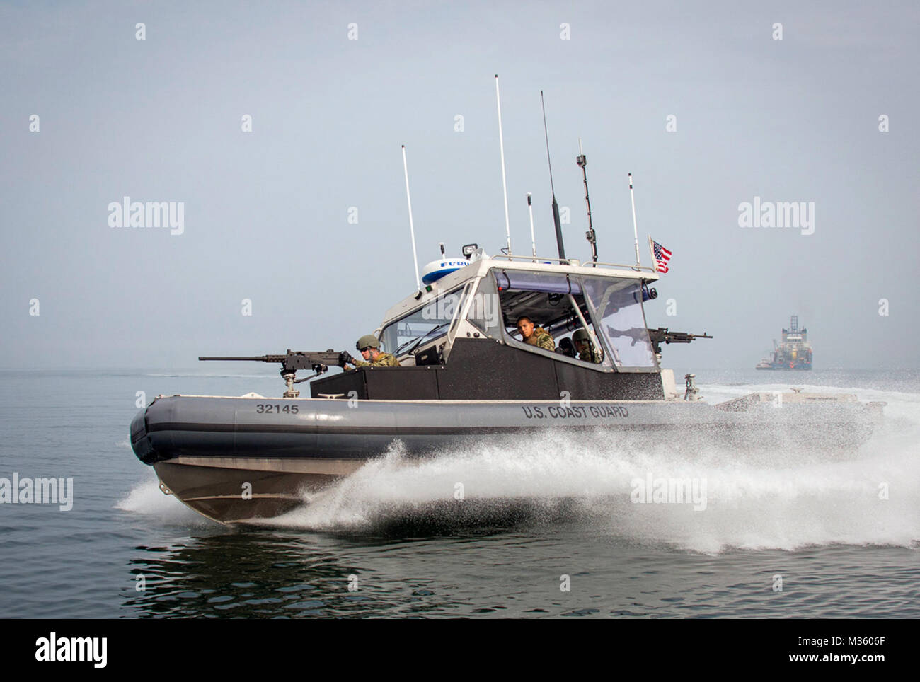U.S. Coast Guardsmen, assigned to Port Security Unit 309 in Port ...