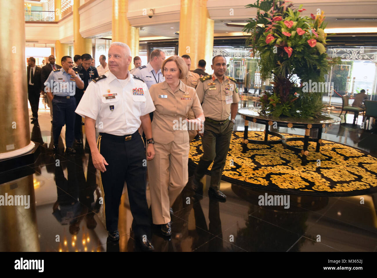 Major General Lawrence Brock III (left) and Rear Admiral Kathleen M ...