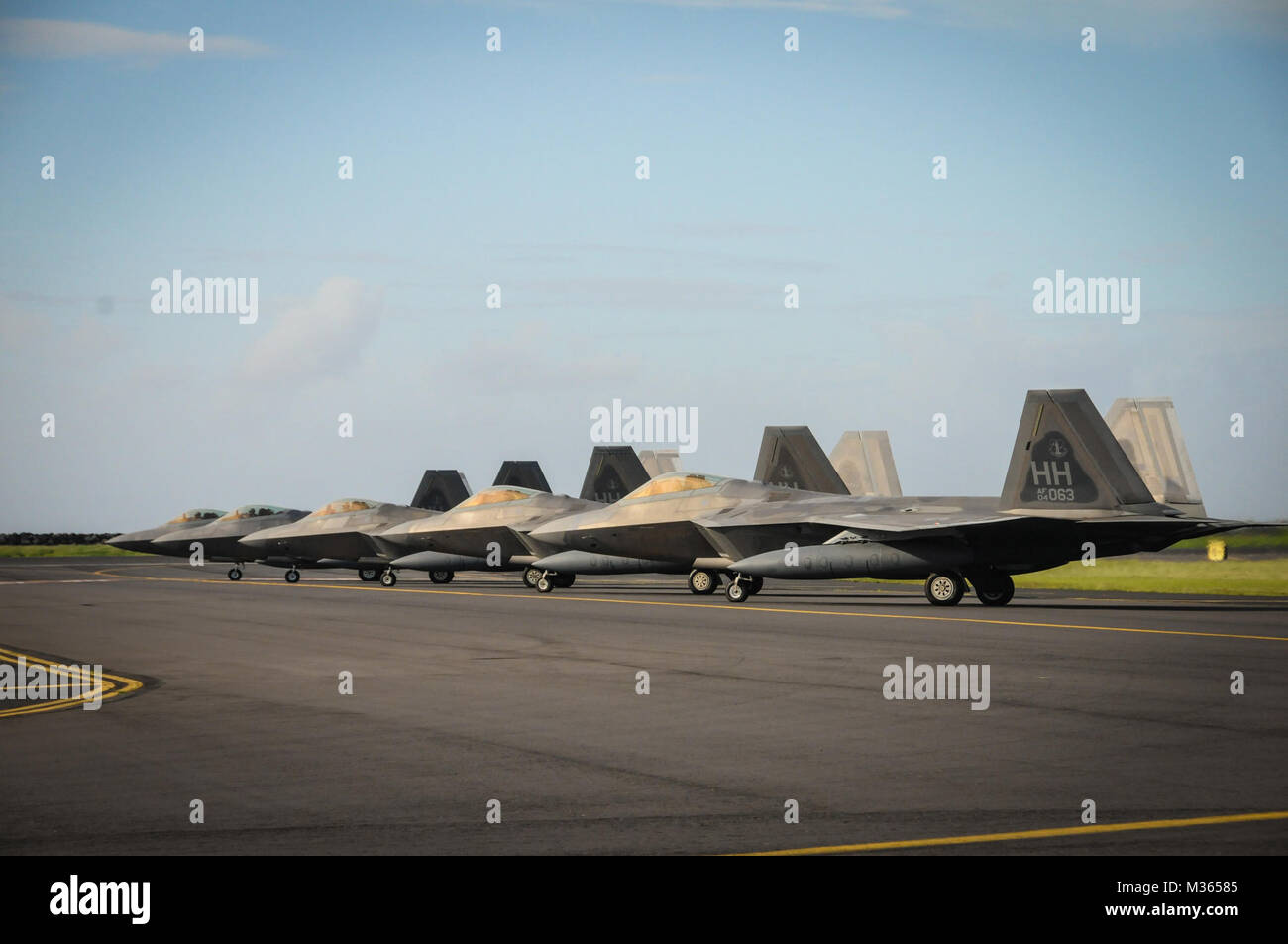 The Hawaii Air National Guard F-22 Raptors prepare for take off at ...