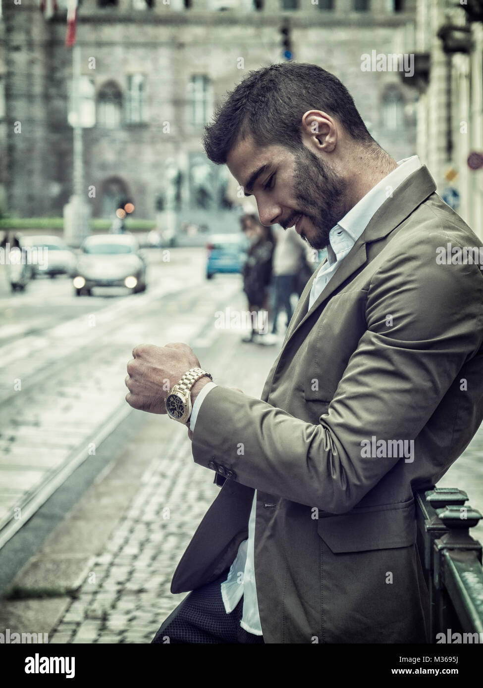 Attractive man outdoor wearing elegant jacket, in European city, Turin ...