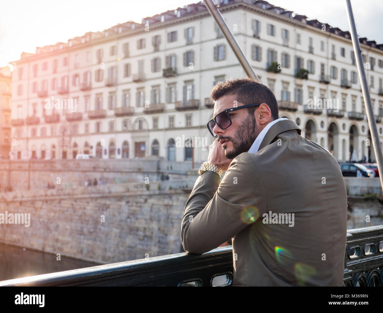 Attractive man outdoor wearing elegant jacket, in European city, Turin ...