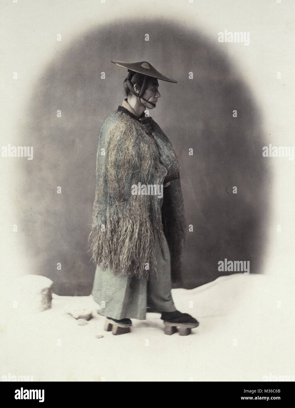 1860's Japan - portrait of a man in a straw rain coat Stock Photo - Alamy