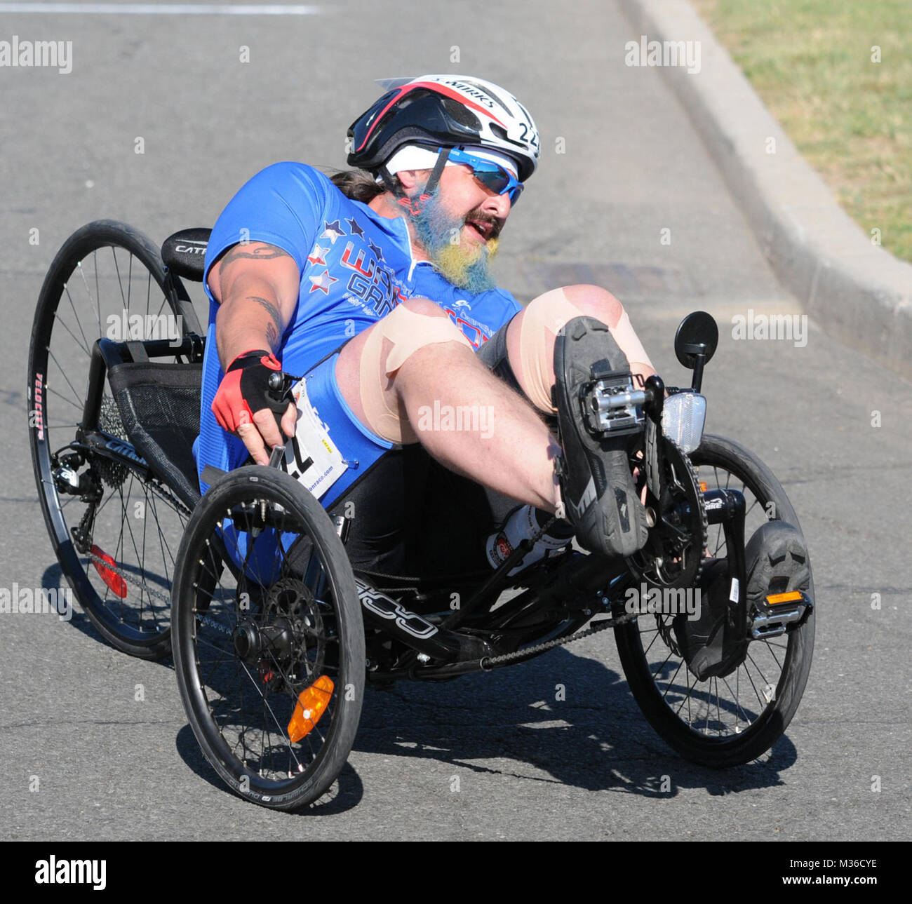 Air Force Veteran Tech Sgt. Cory Anderson take a tight curve during the ...