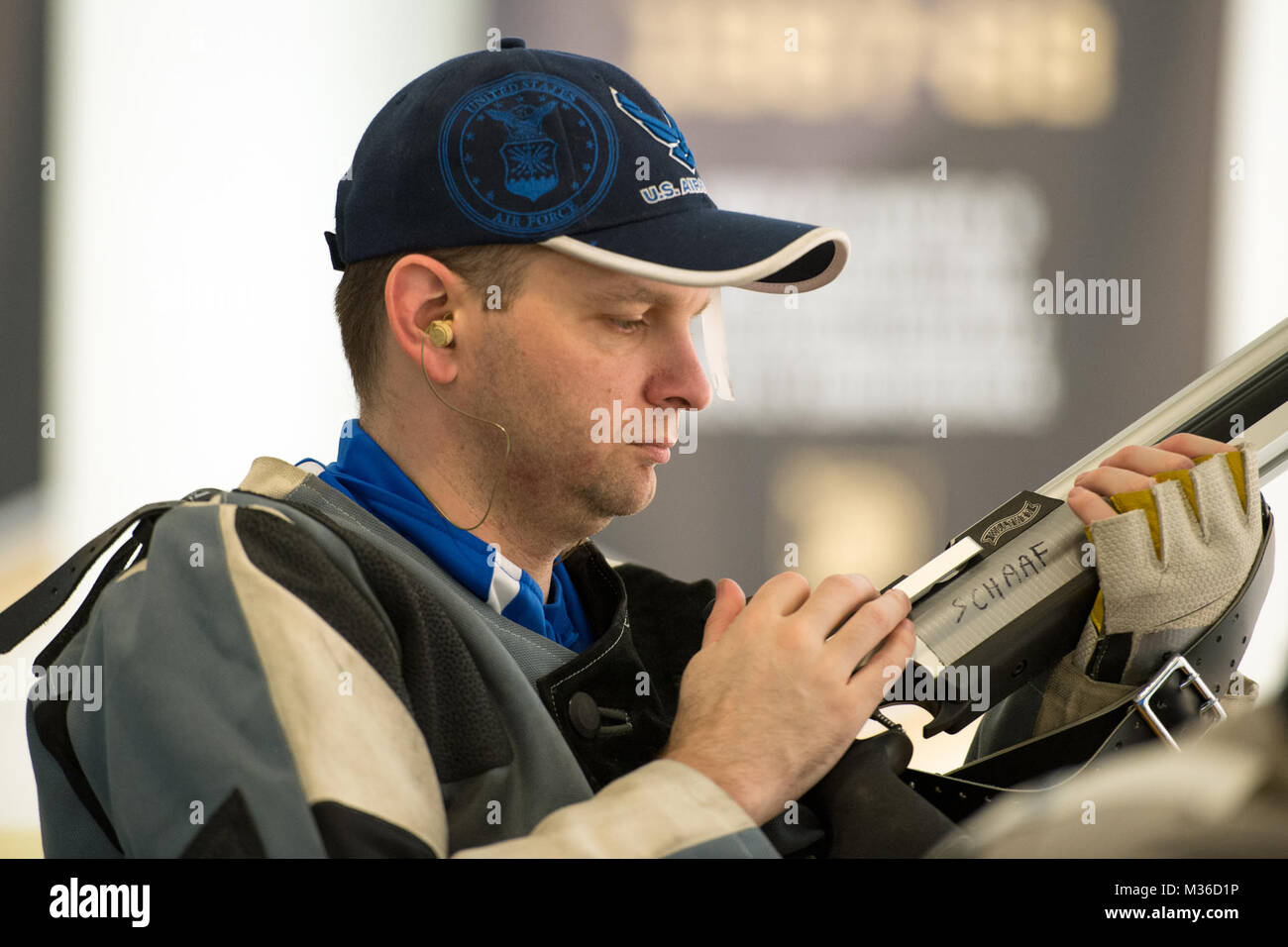 Air Force veteran Tech. Sgt. Brian Schaaf readies his air rifle for the ...