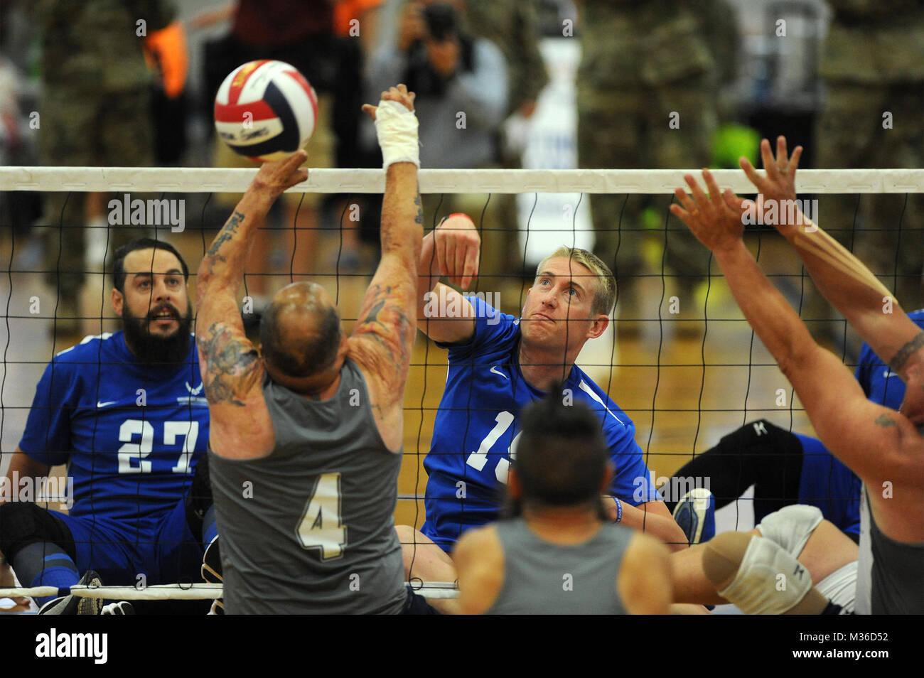U.S. Air Force Capt. Cal Gentry from West Jordan, Utah, spikes the ball ...