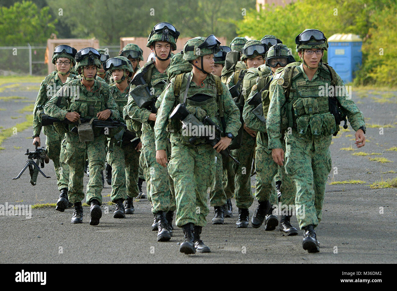 Soldiers assigned to the 9th Infantry Brigade, 6th Division, Singapore ...