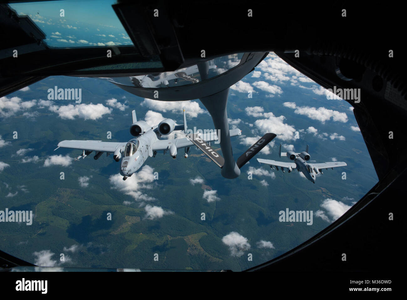 A KC-135R Stratotanker with the 121st Air Refueling Wing refuels A-10C ...