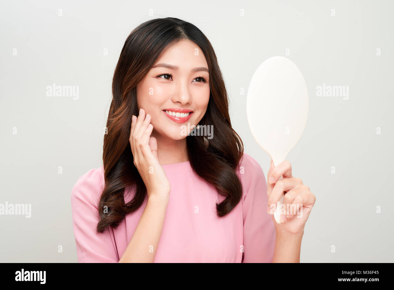 Hand touching mirror hi-res stock photography and images - Alamy