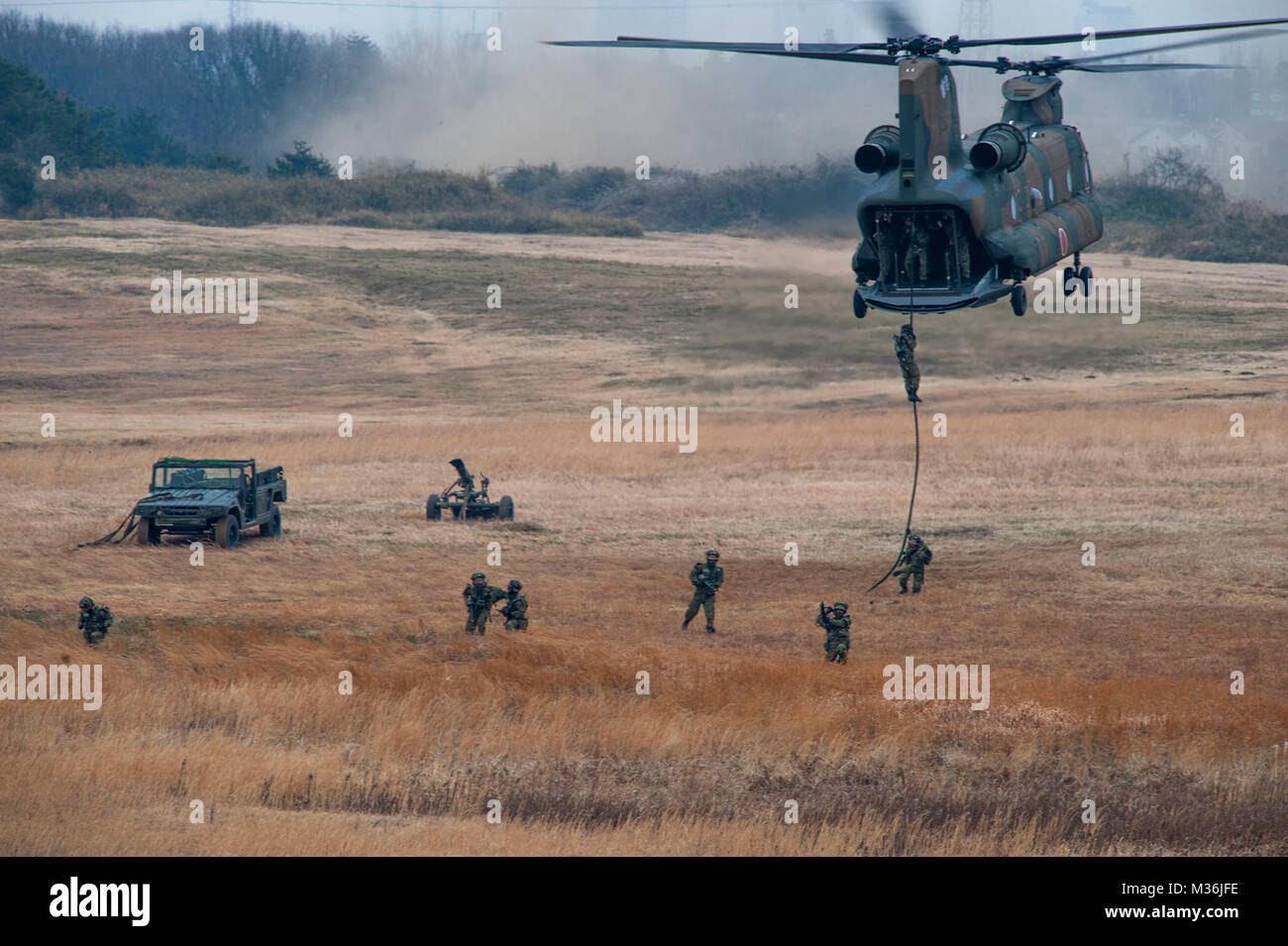 JGSDF soldiers conduct combat exercises as part of the annual jump ...