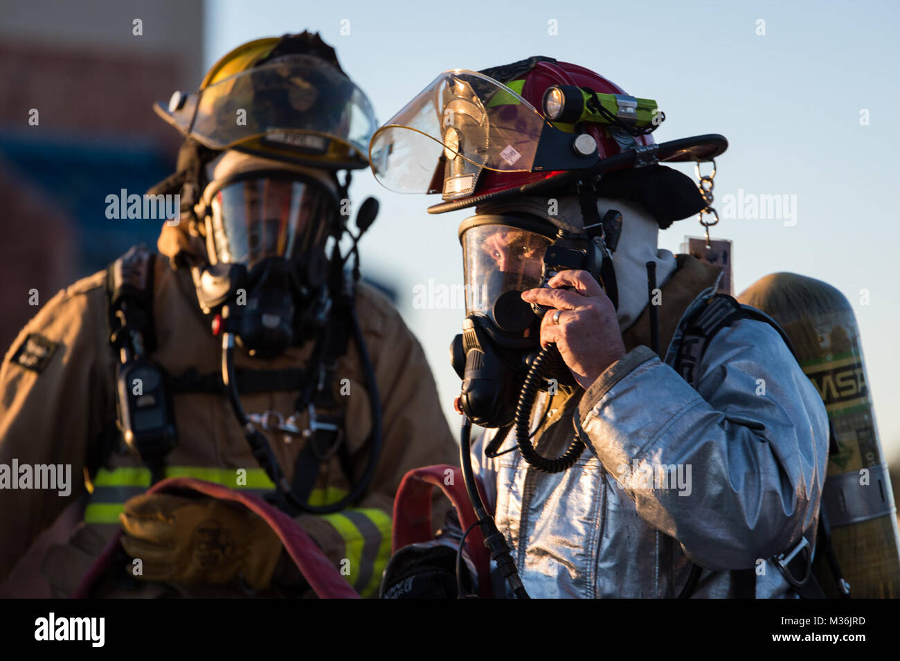 First responders with the 153rd Fire Emergency Services respond to a ...