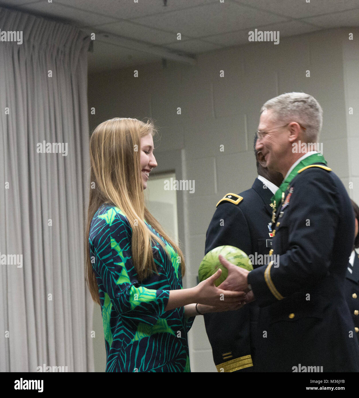 Col. Joachim Strenk presents his daughter, Jessie Strenk, with a ...