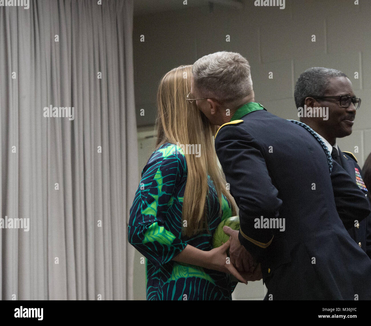 Col. Joachim Strenk presents his daughter, Jessie Strenk, with a ...